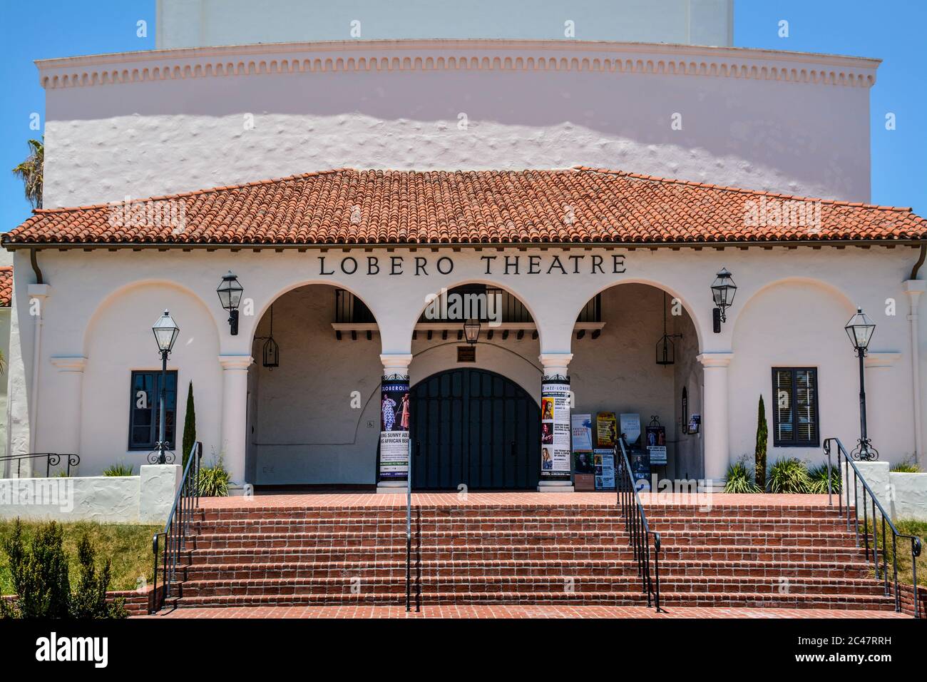 Entrance to the Spanish Colonial revival style Lobero Theatre with red ...