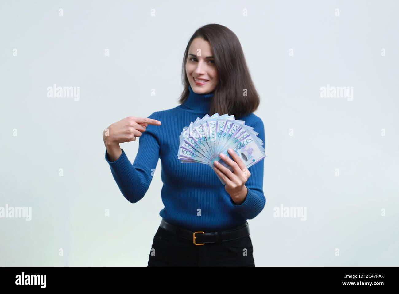 Girl banknotes in hands hi-res stock photography and images - Alamy