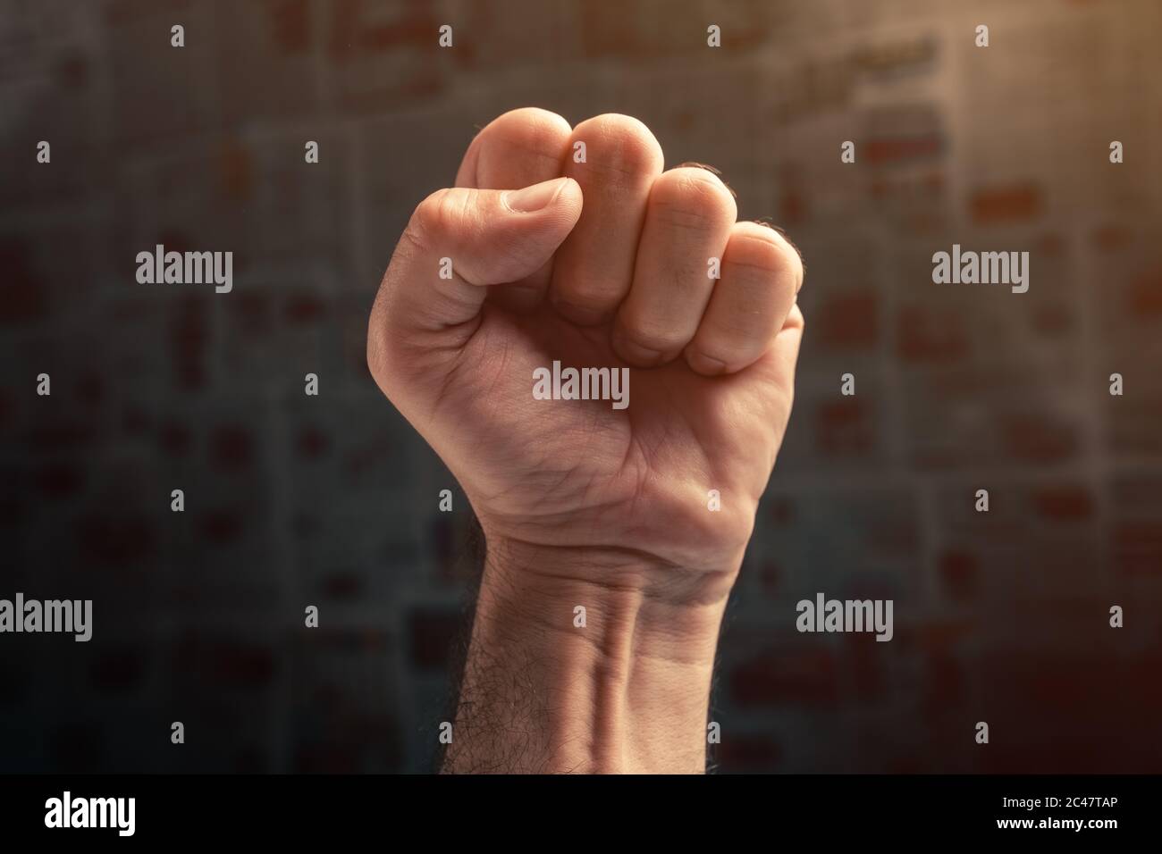 Raised fist hi-res stock photography and images - Alamy