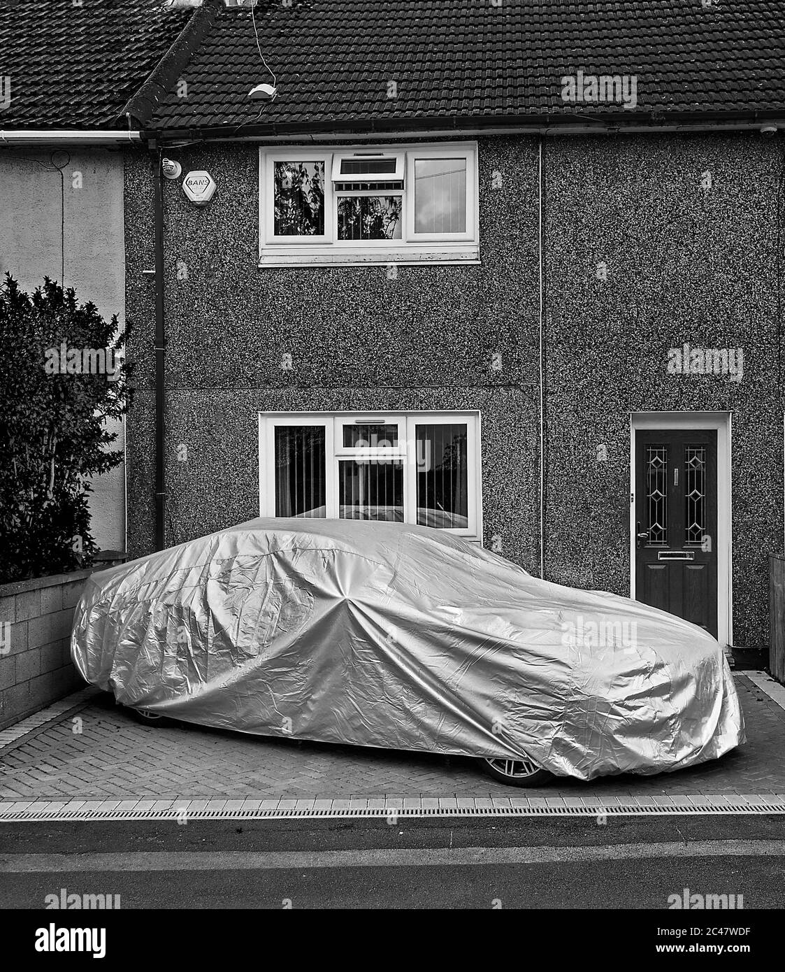 Grey car parked on Black and White Stock Photos & Images - Alamy