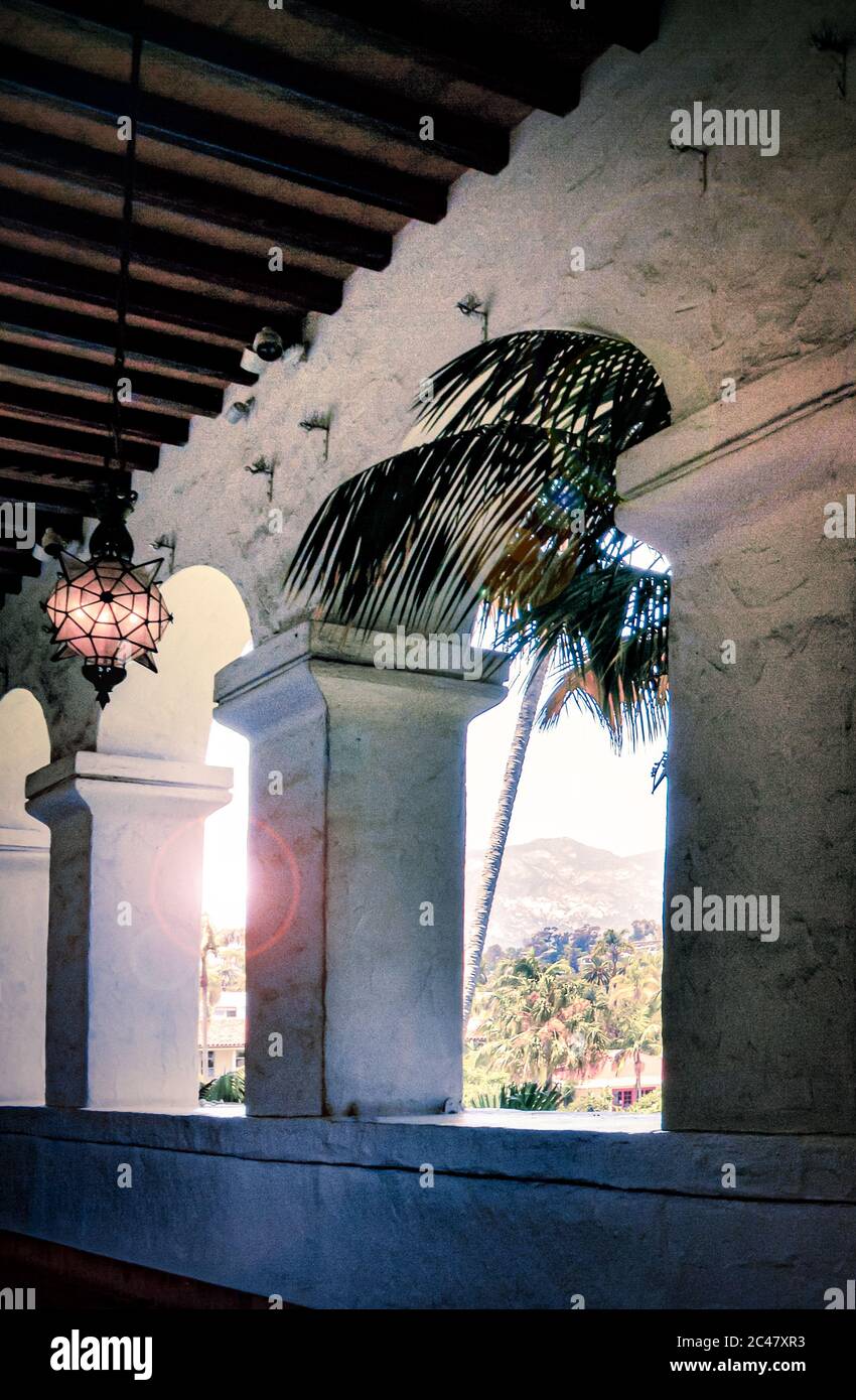 View from Spanish Moorish style colonnade with arches and surrounded by ...