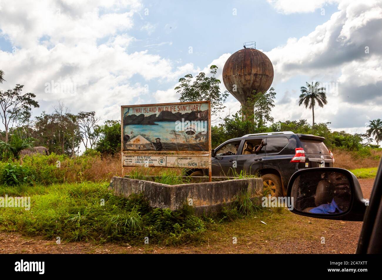 Directional sign to the Tiwai Islands in Sierra Leone Stock Photo - Alamy
