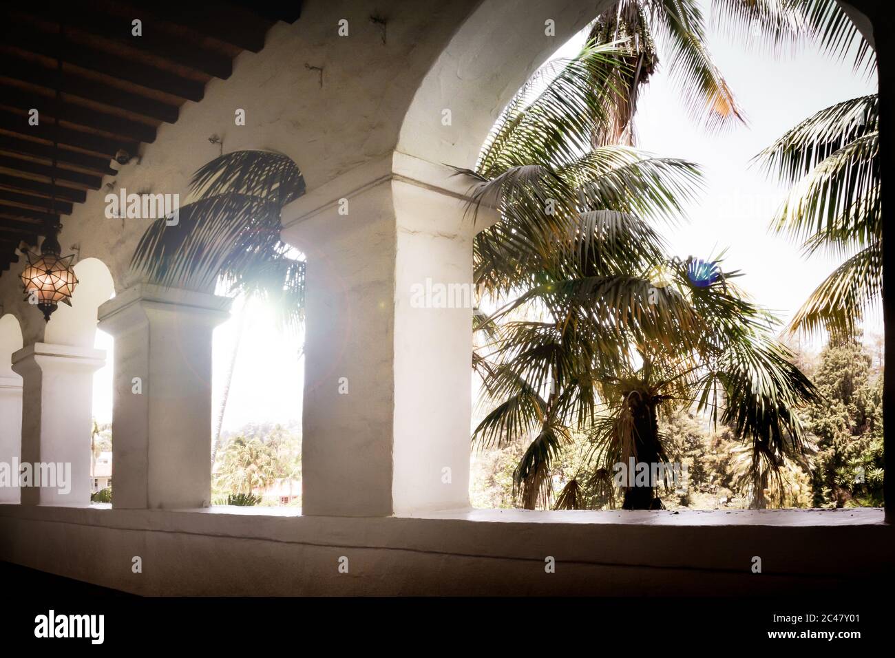 View from Spanish Moorish style colonnade with arches and surrounded by ...