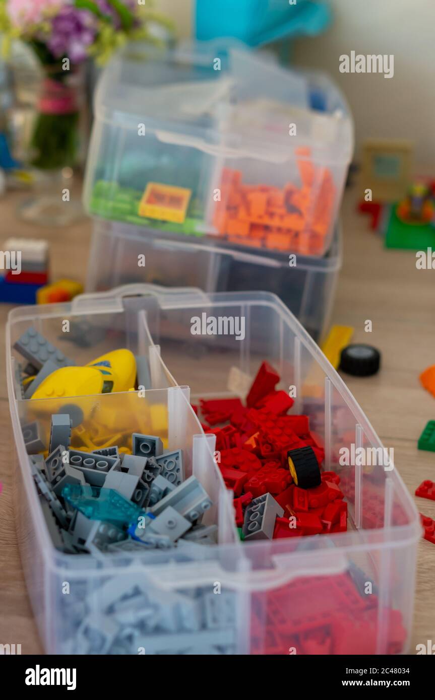 POZNAN, POLAND - May 24, 2020: Plastic Lego bricks in a container on a ...