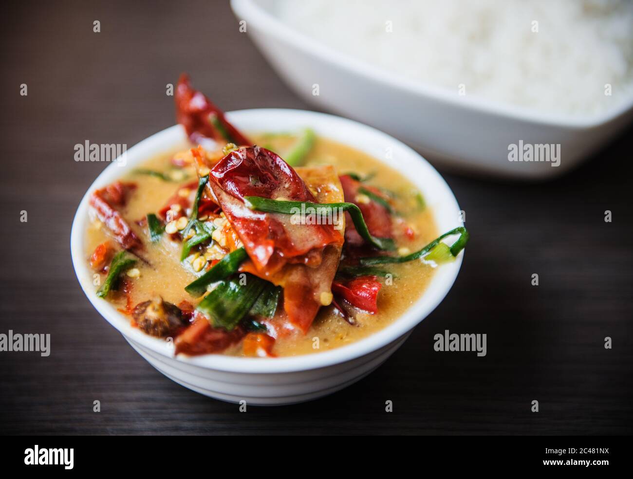 Bhutanese Ema Datsi (chili peppers with cheese sauce Stock Photo - Alamy