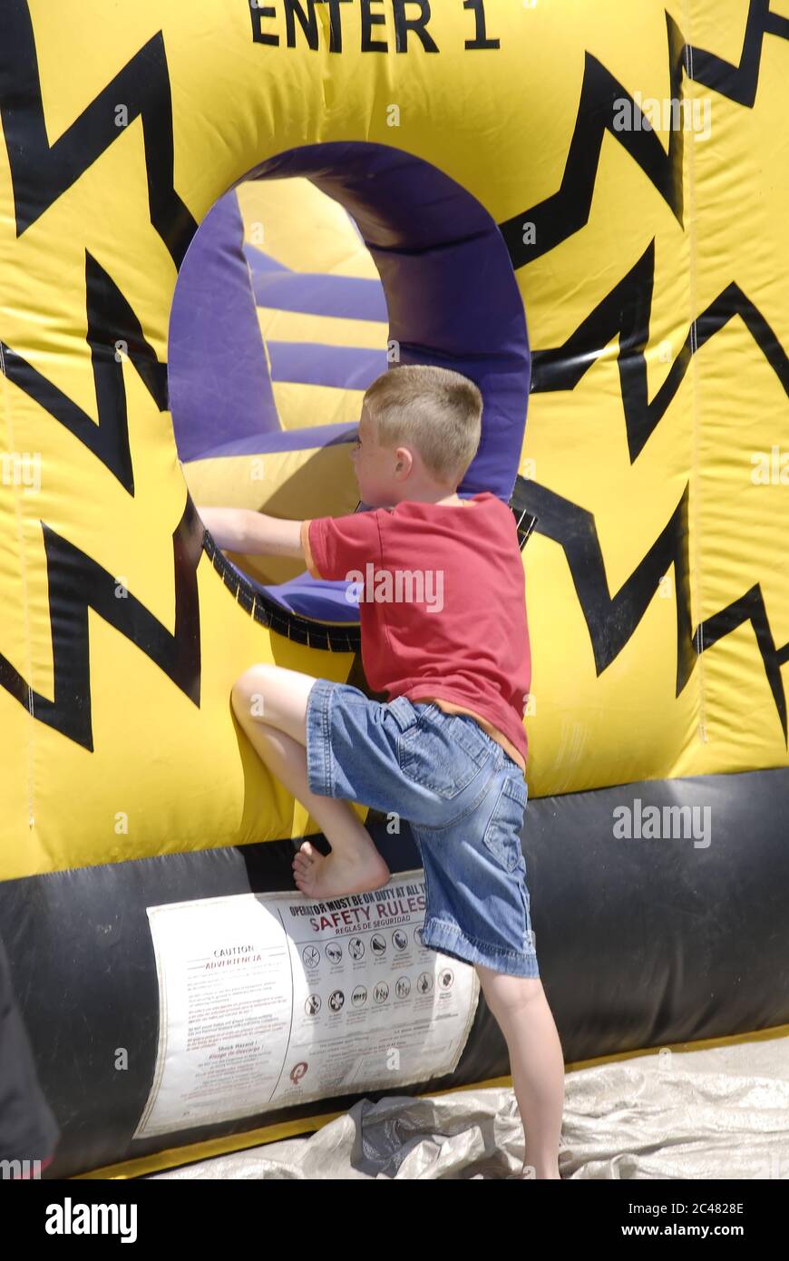 ST. CHARLES, UNITED STATES - Oct 21, 2008: Boy playing on inflatable ...