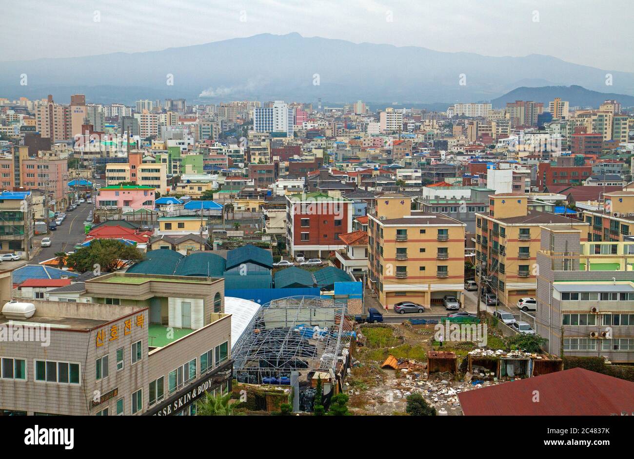 Jeju City and Hallasan mountain Stock Photo - Alamy