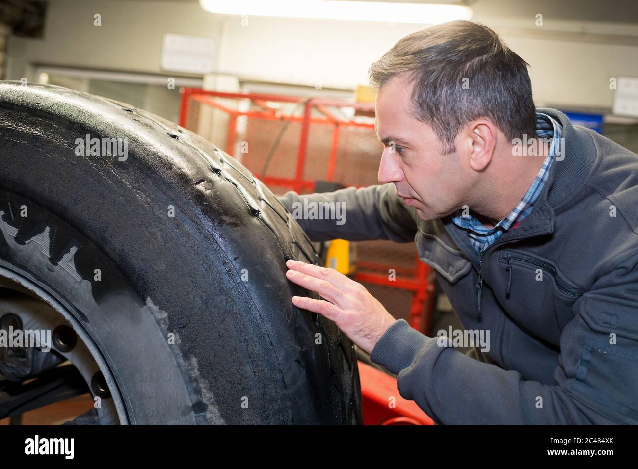 Man fixing tractor hi-res stock photography and images - Alamy