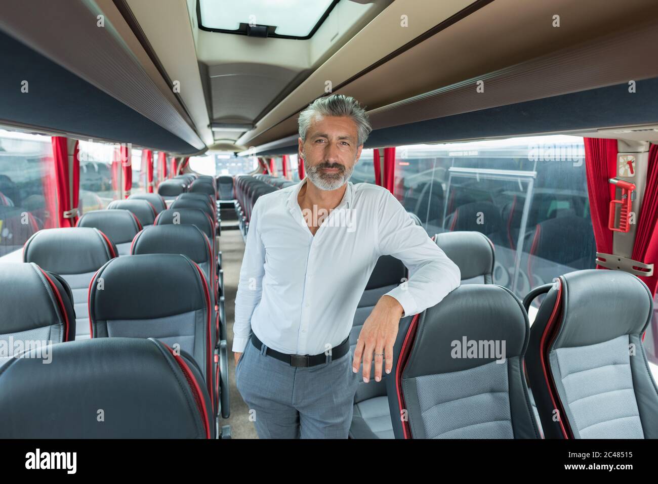 man on a bus posing Stock Photo - Alamy