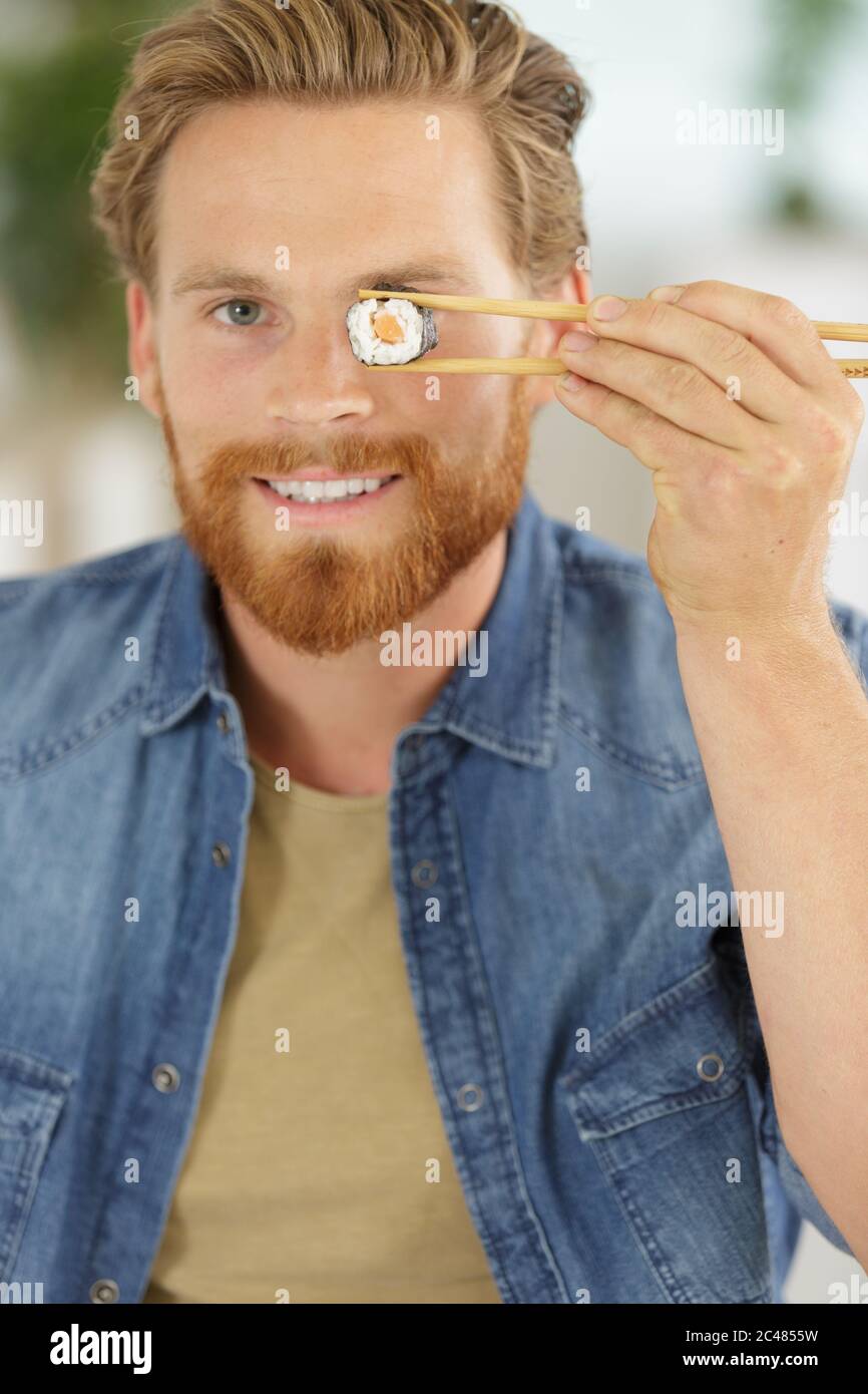 Young man pointing fish hi-res stock photography and images - Alamy