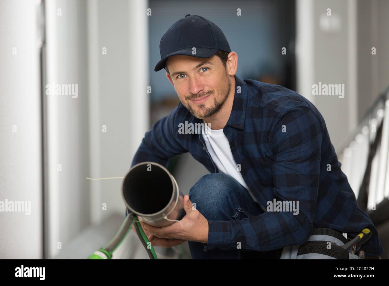 We are fixing pipes hi-res stock photography and images - Alamy