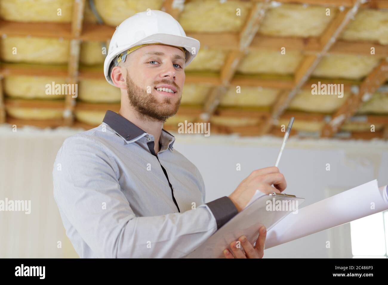 portrait of handsome architect or designer standing Stock Photo - Alamy