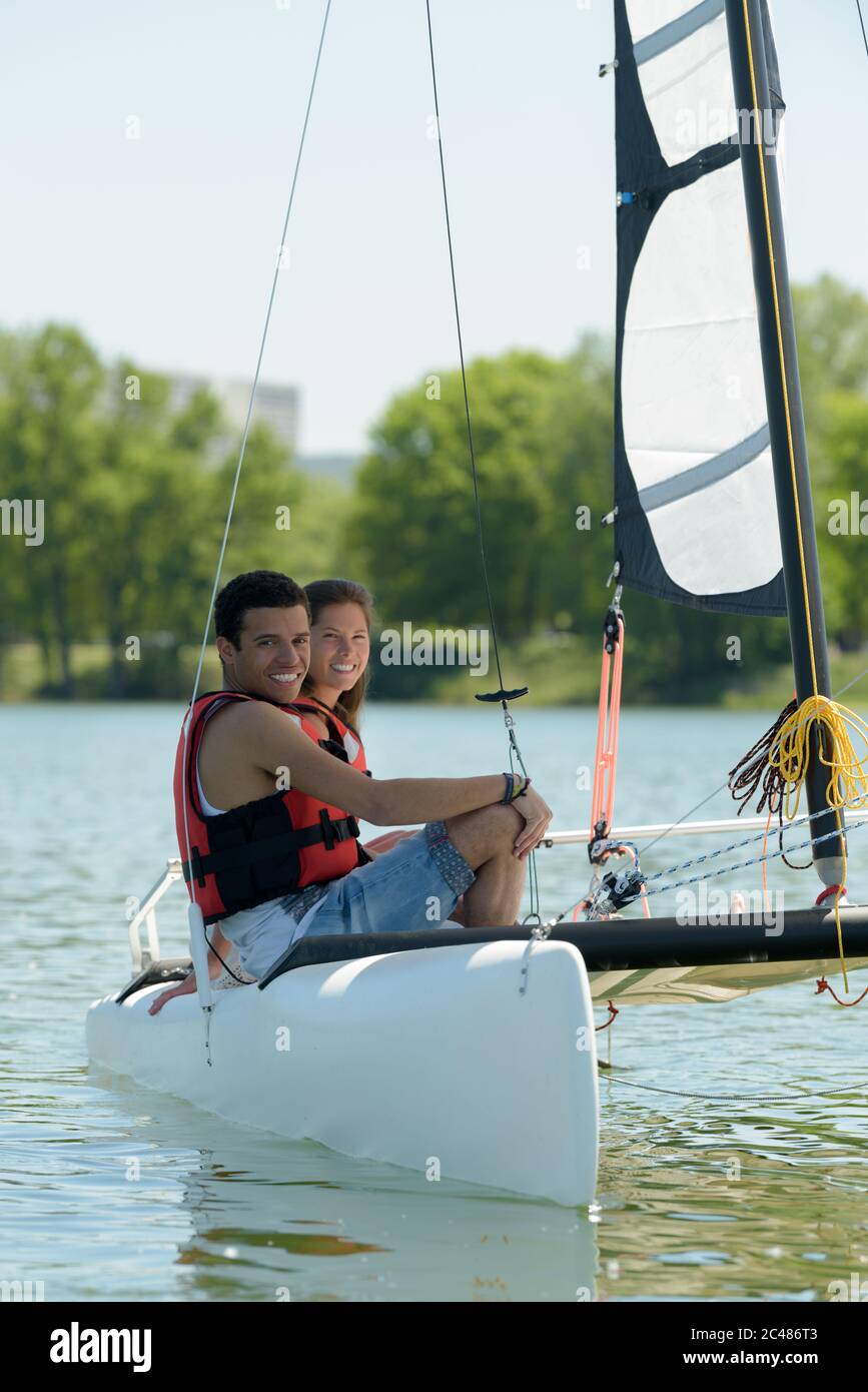 couples sailing on a lake Stock Photo - Alamy