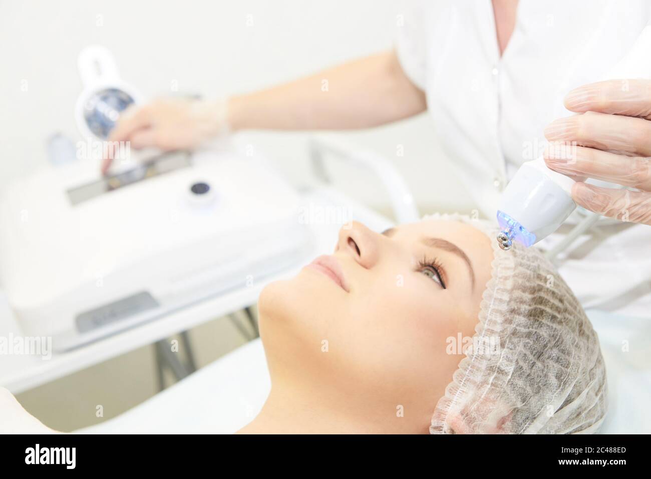 Microcurrent facial dermatology procedure. Model. Aesthetic ...