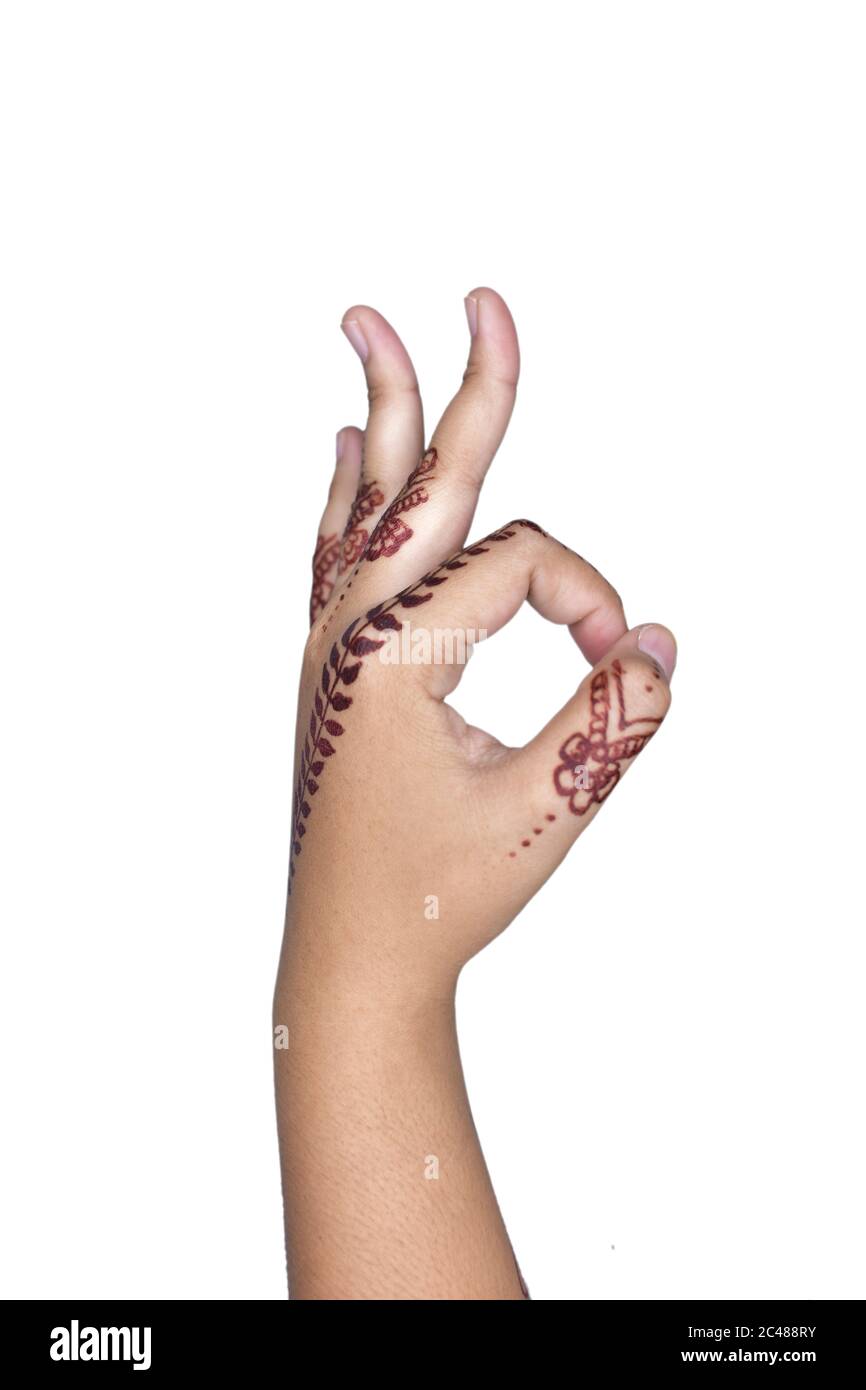 Woman Hands with black mehndi tattoo. Hands of Indian bride girl with ...