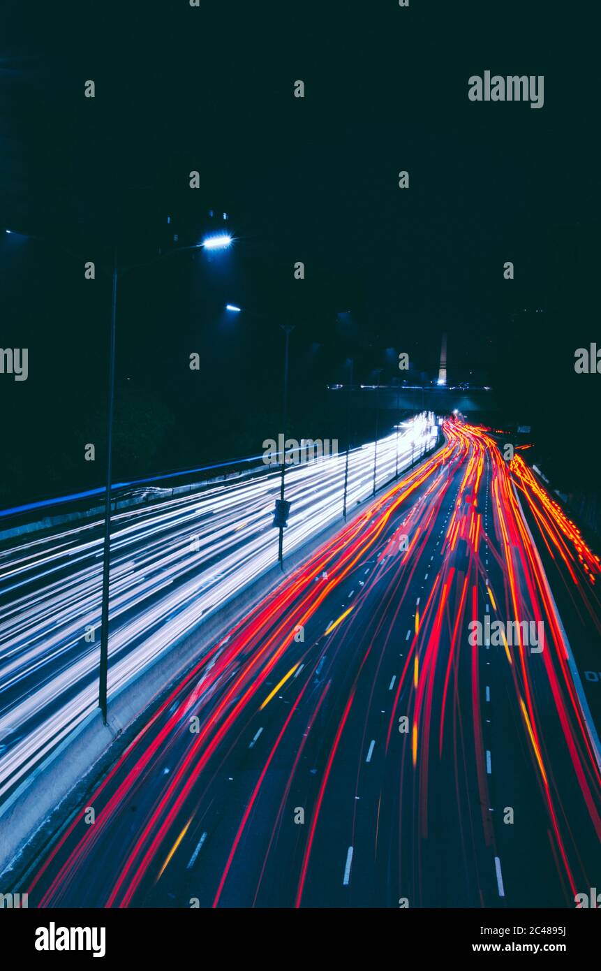 Aerial shot of a dark highway with traffic light trails Stock Photo - Alamy