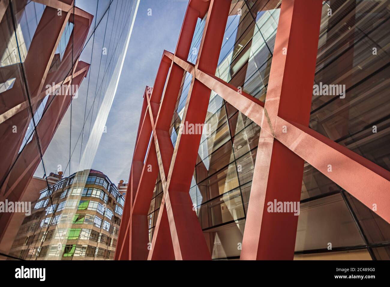 Low angle shot of the red metal frame in front of the building Stock ...