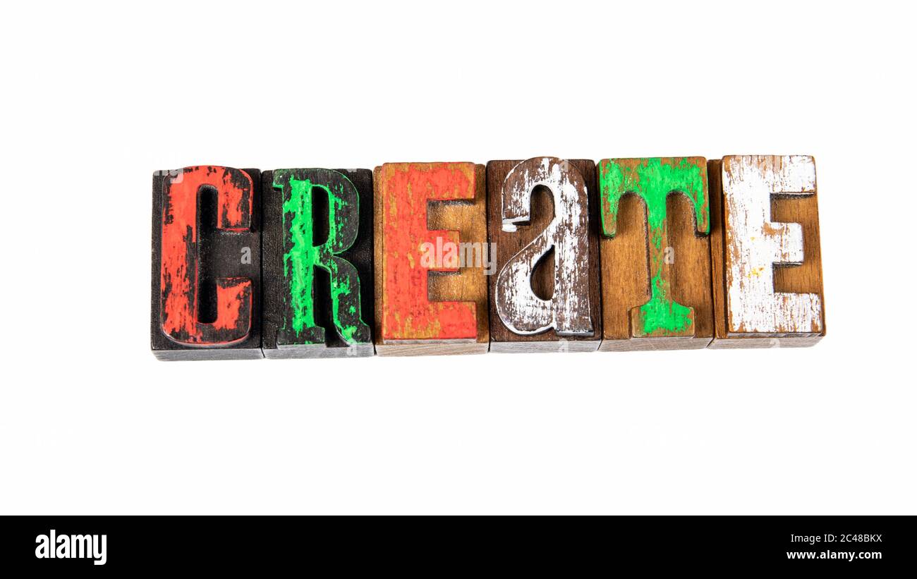 CREATE. Colored wooden letters on a white background Stock Photo - Alamy