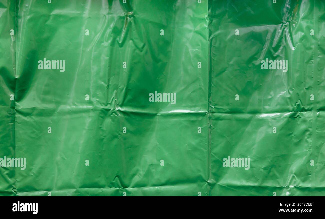 green crumpled vinyl cover. wrinkled plastic textured background Stock ...