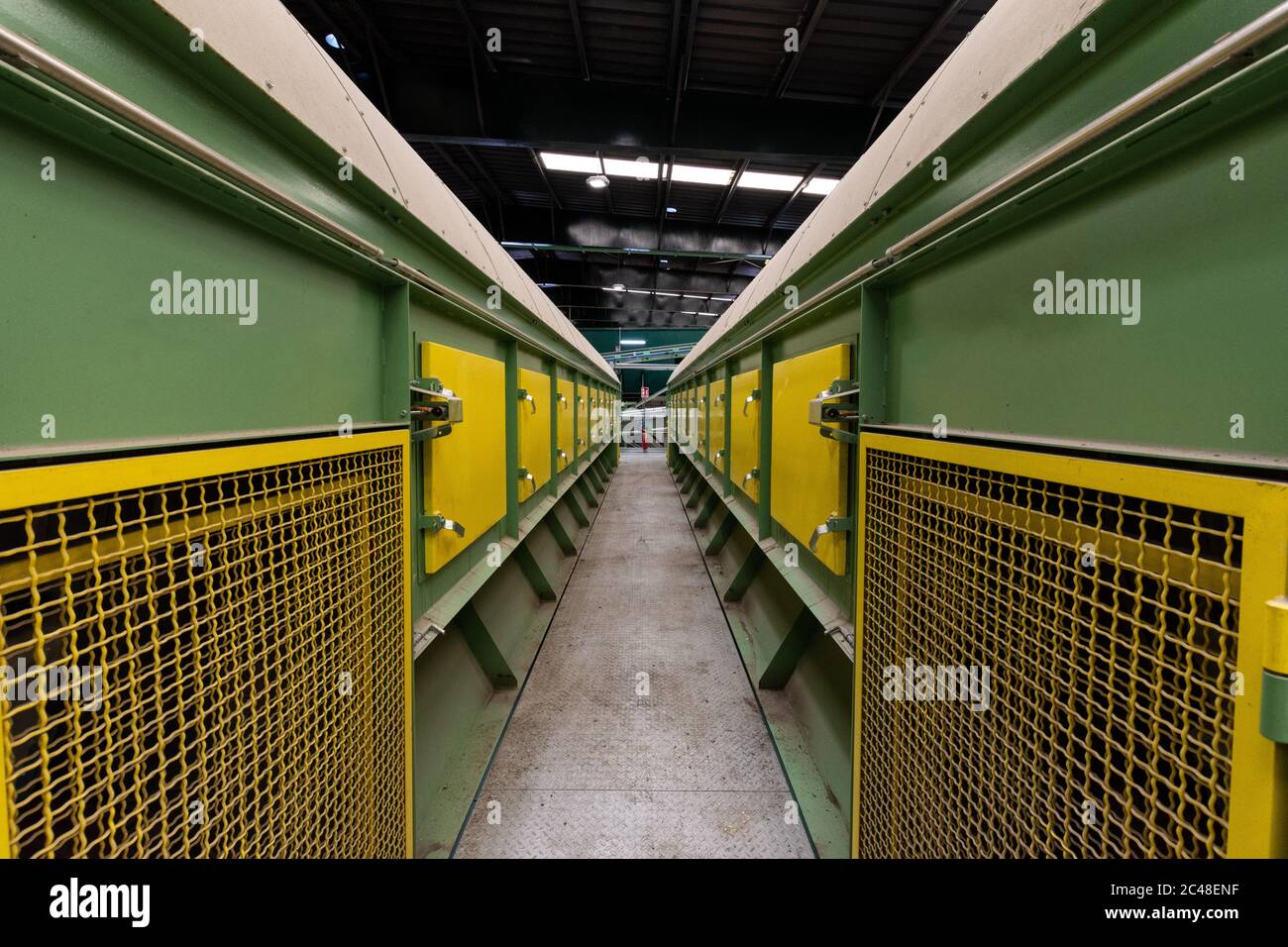 Beautiful shot of a narrow path in a production unit of a factory Stock ...