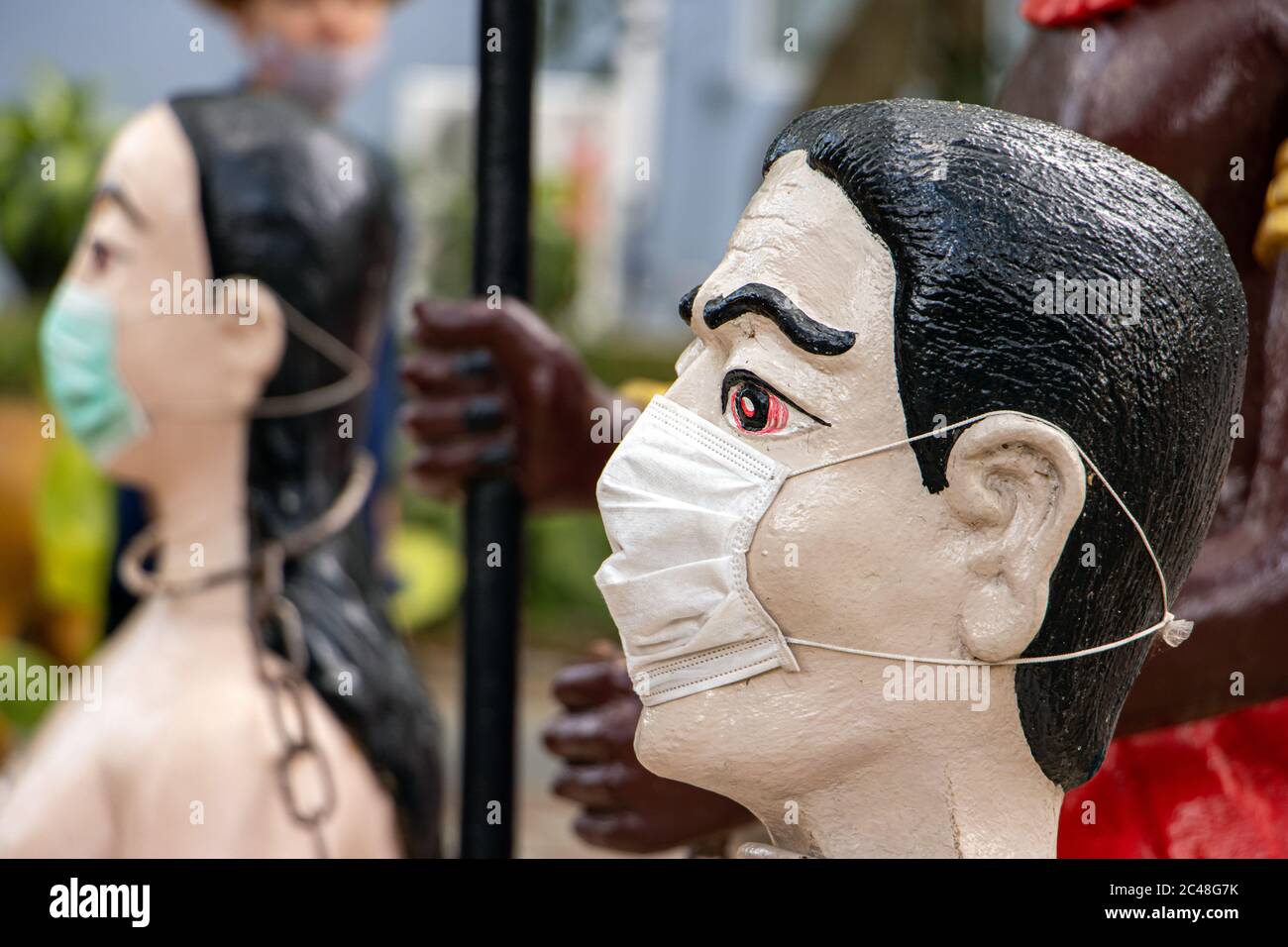 The portrait of Thai pair with face mask in the Buddhist hell, Wat ...