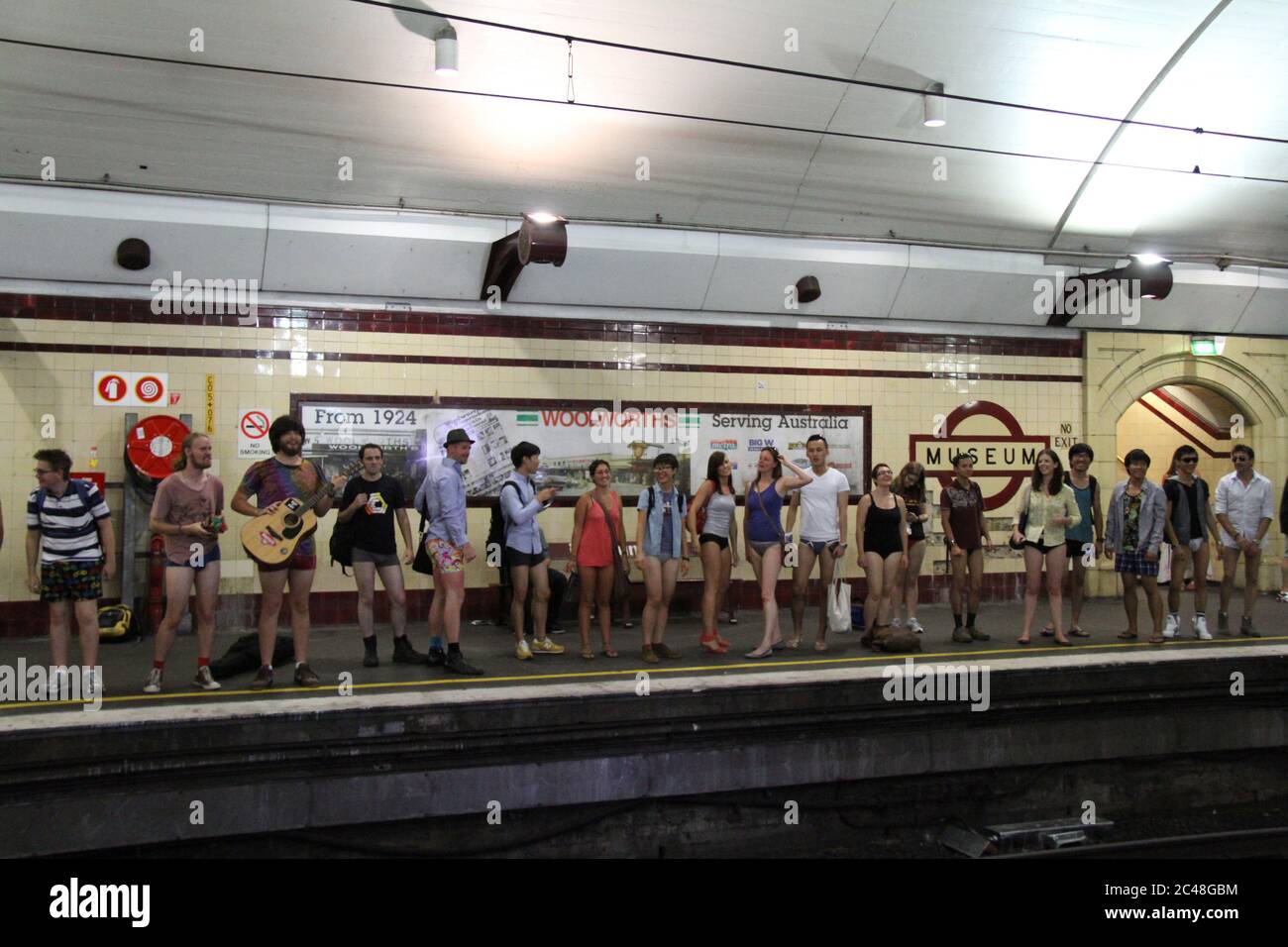 Some Sydney No Pants Subway Ride participants wait for their train at ...