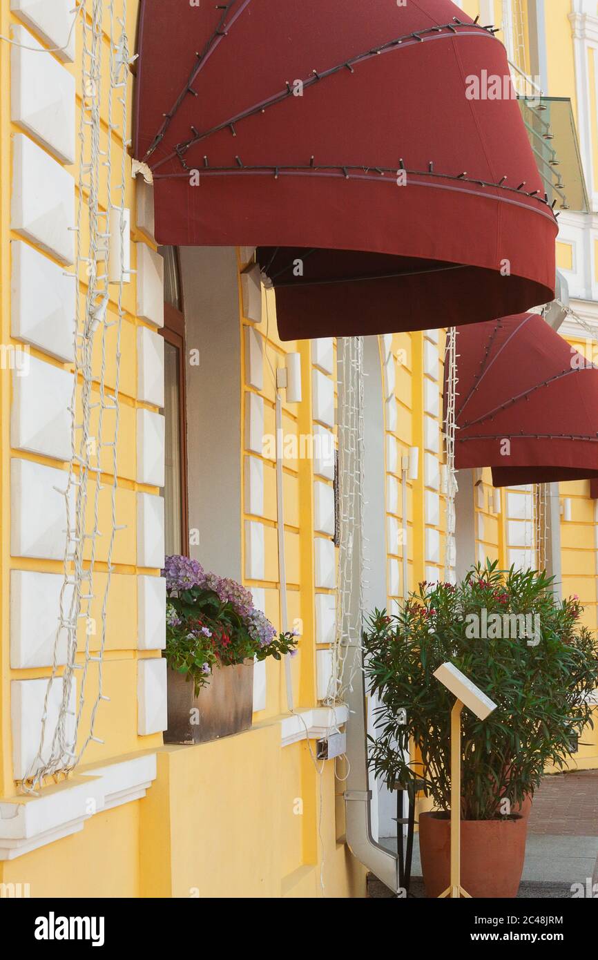 Сolourful Building with Yellow Wall in the Old Town extreme closeup ...