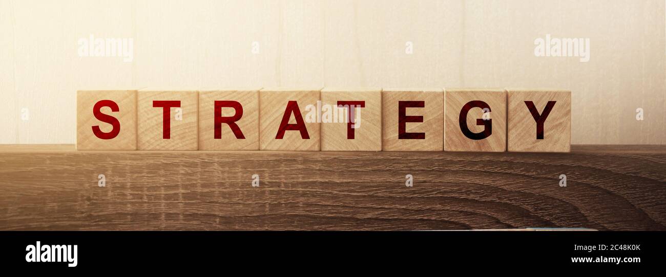 Strategy Word on Wooden building Cubes. Business management concept ...