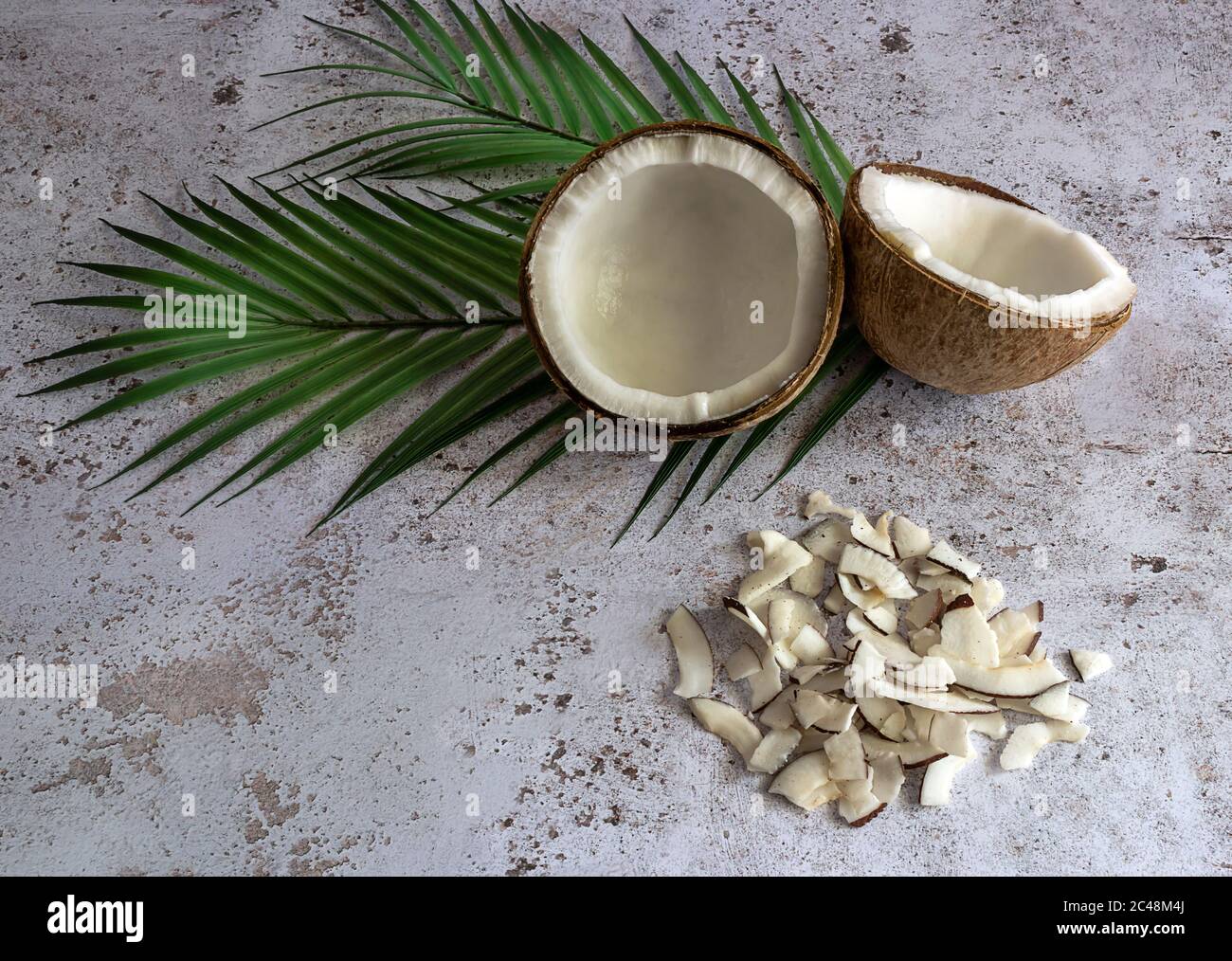 Healthy snack concept. Fresh coconut and chips Stock Photo - Alamy