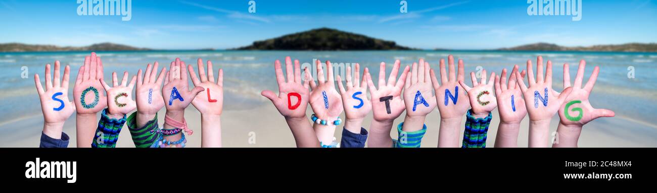 Children Hands Building Word Social Distancing, Ocean Background Stock ...