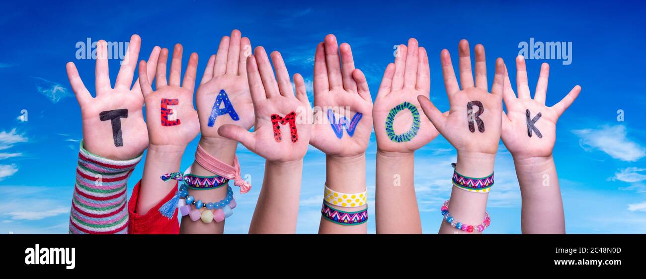 Children Hands Building Word Teamwork, Blue Sky Stock Photo - Alamy