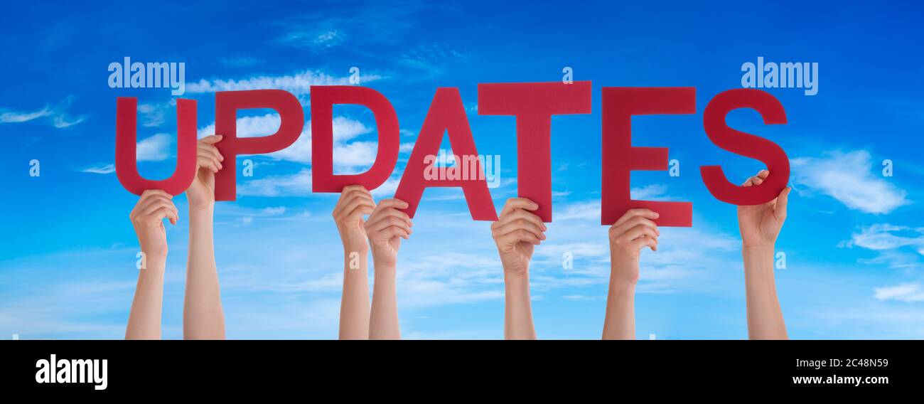 People Hands Holding Word Updates, Blue Sky Stock Photo - Alamy