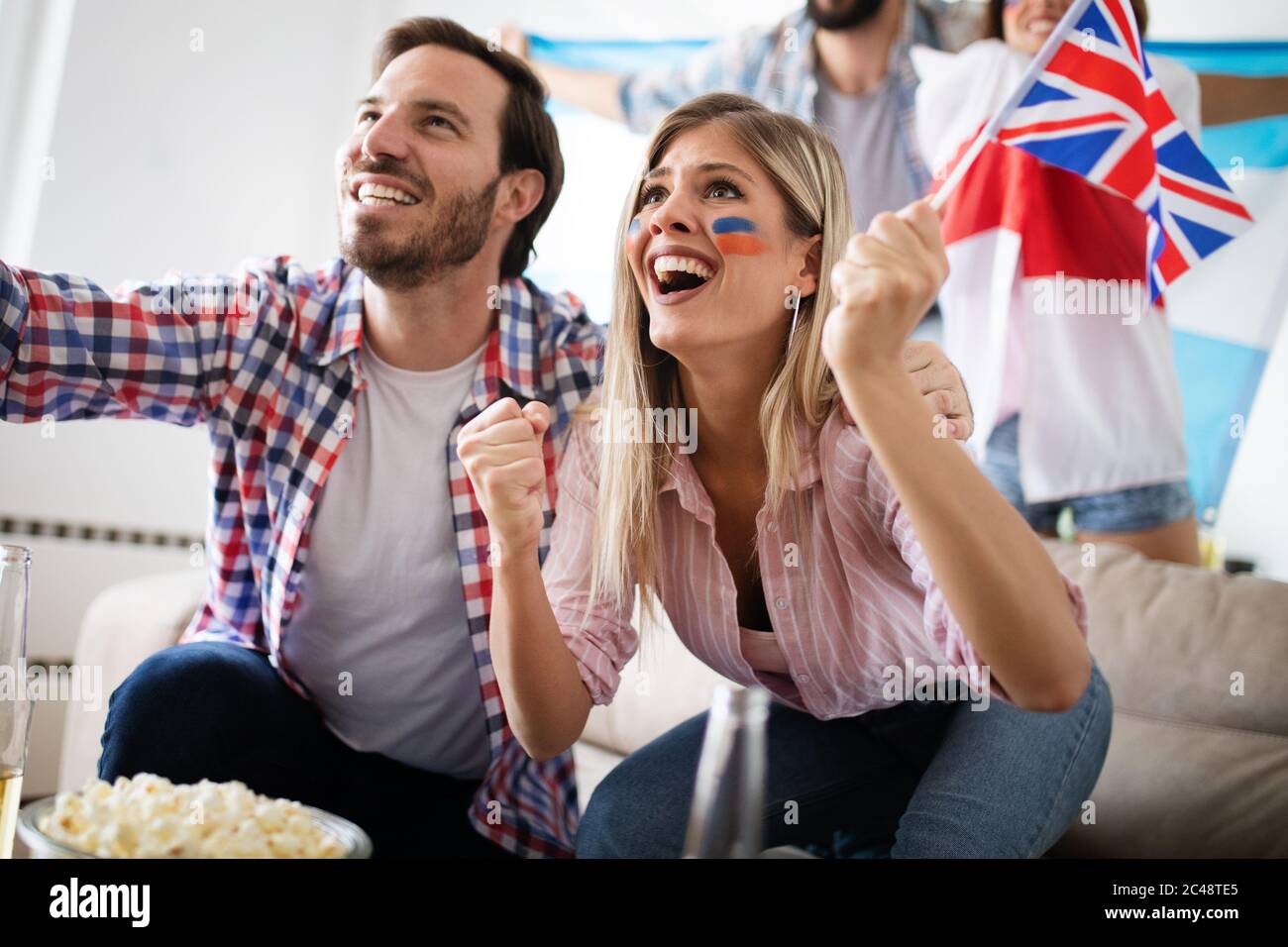 Couple watching the olympic games hi-res stock photography and images ...