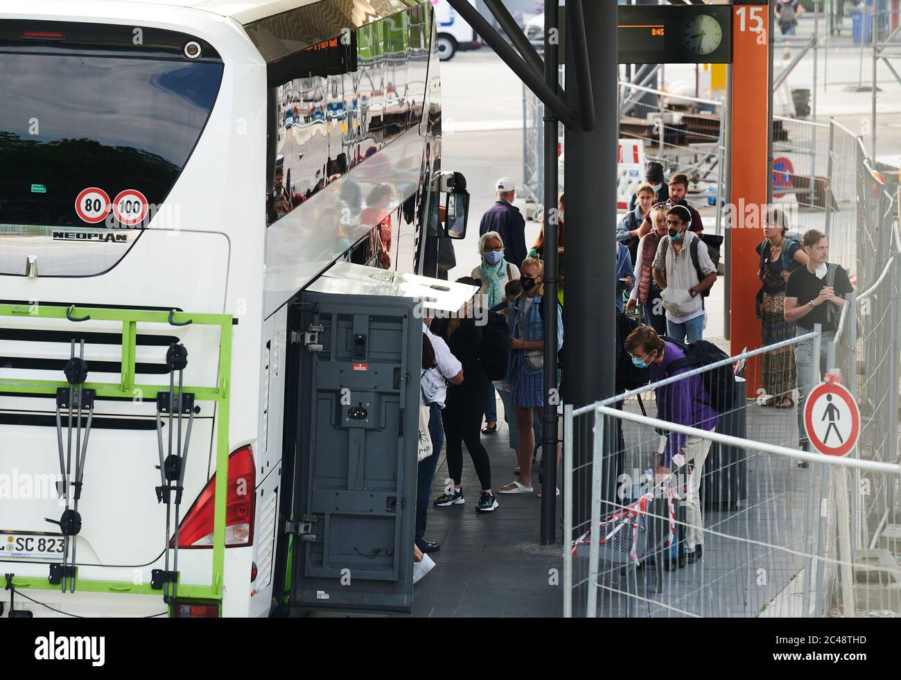 Berlin, Germany. 25th June, 2020. Travellers bring their luggage to the ...