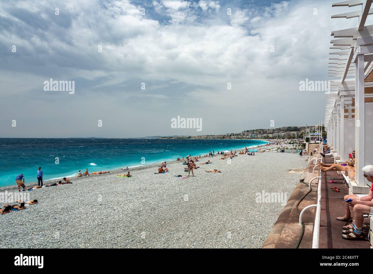 Nice, France - June 14, 2019 : Tourists enjoying their day on the beach ...