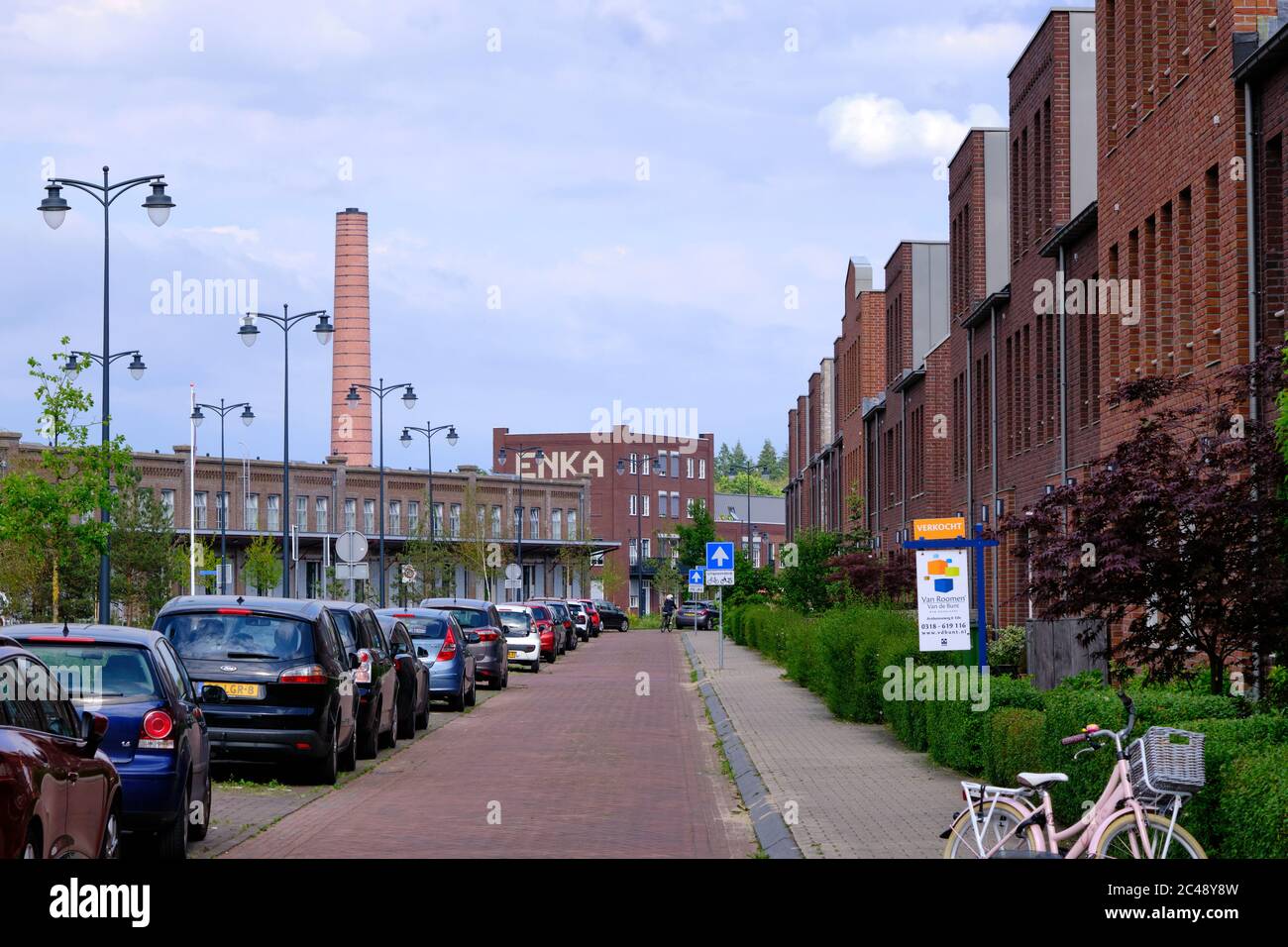 Ede, the Netherlands,June,20,2020: street,new houses, old Enka factory ...