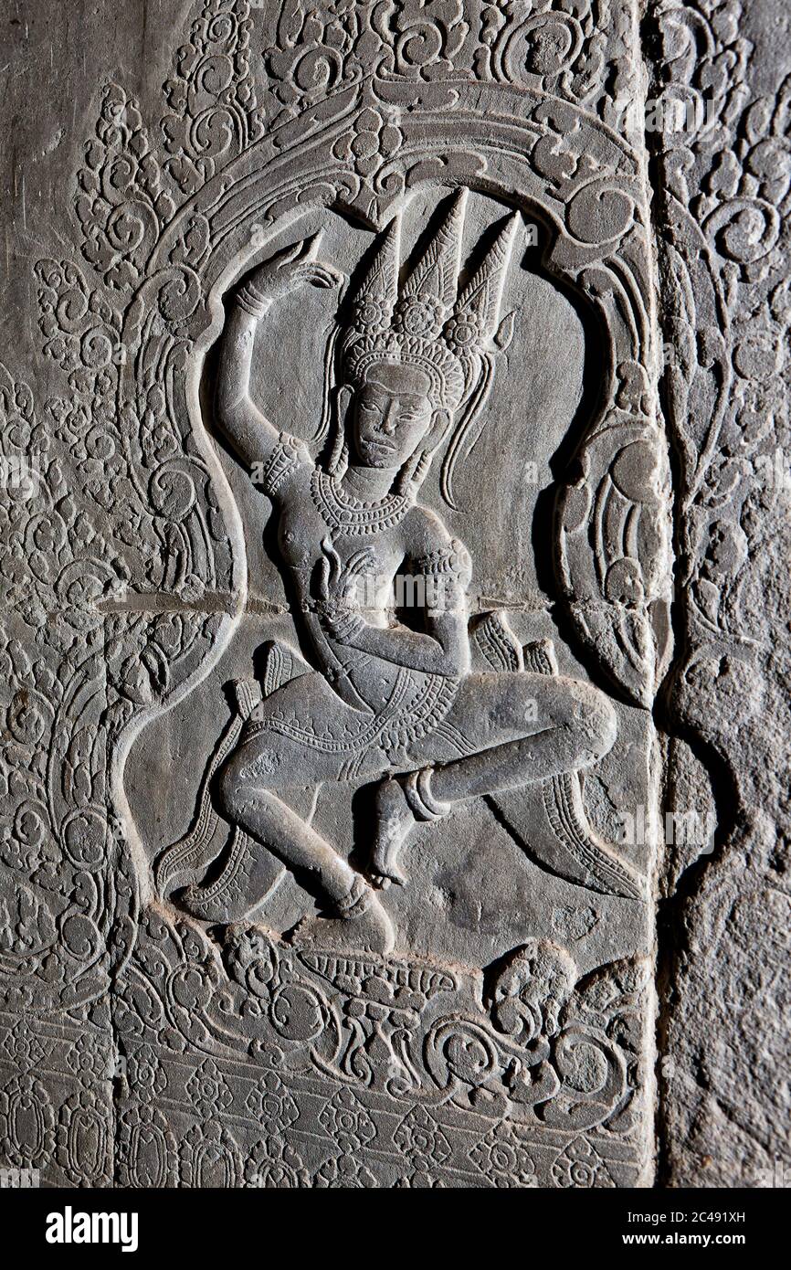 Bas-relief of a dancing Apsara (celestial dancer) at Angkor Wat temple ...