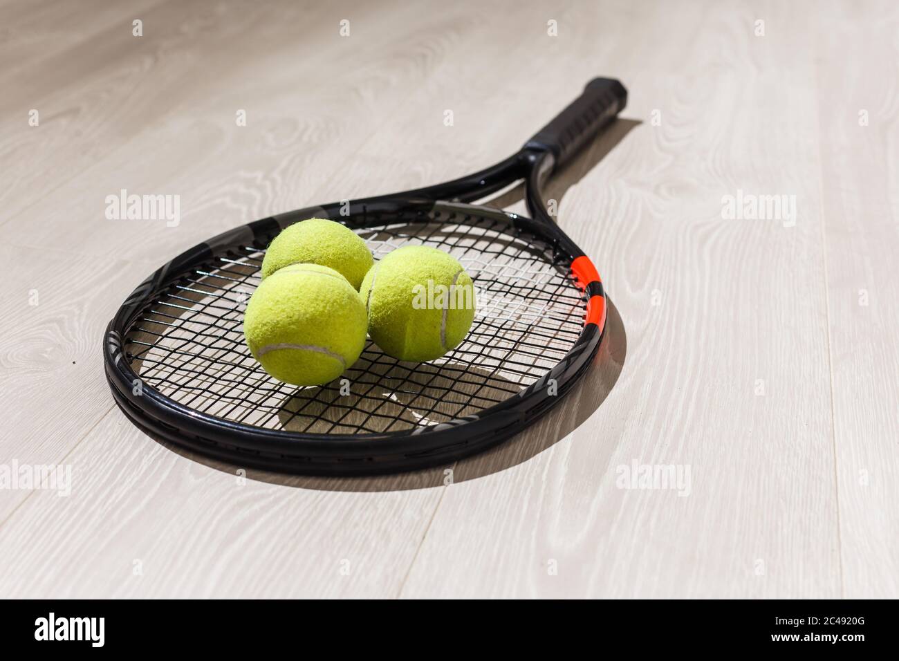 Tennis concept with the balls and racket Stock Photo - Alamy