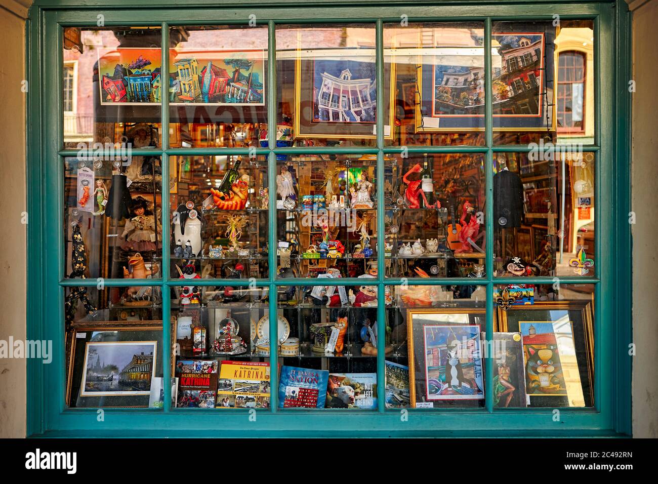Souvenirs displayed in a gift shop window. French Quarter, New Orleans ...