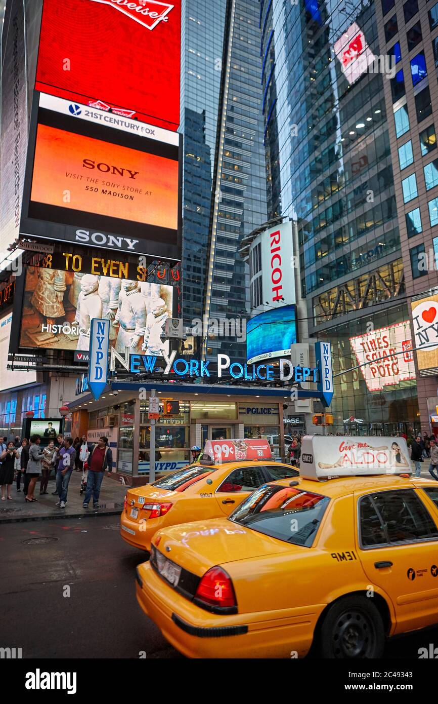 Yellow taxi cabs at NYPD Times Square Precinct. Manhattan, New York ...