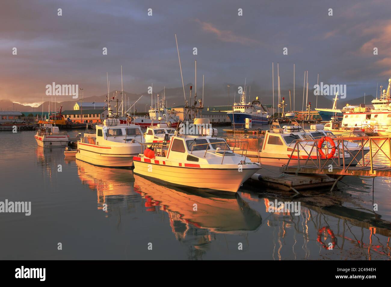 Dramatic sunset over the harbor town of Hofn (Höfn) in south-east ...