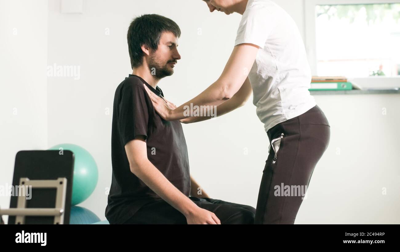 Disabled disability massage masseur hi-res stock photography and images ...