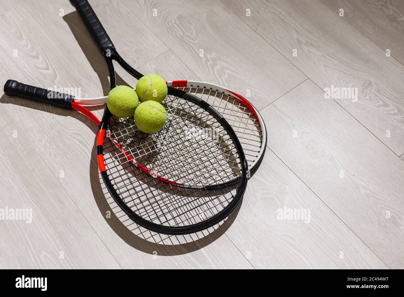 Tennis concept with the balls and racket Stock Photo - Alamy