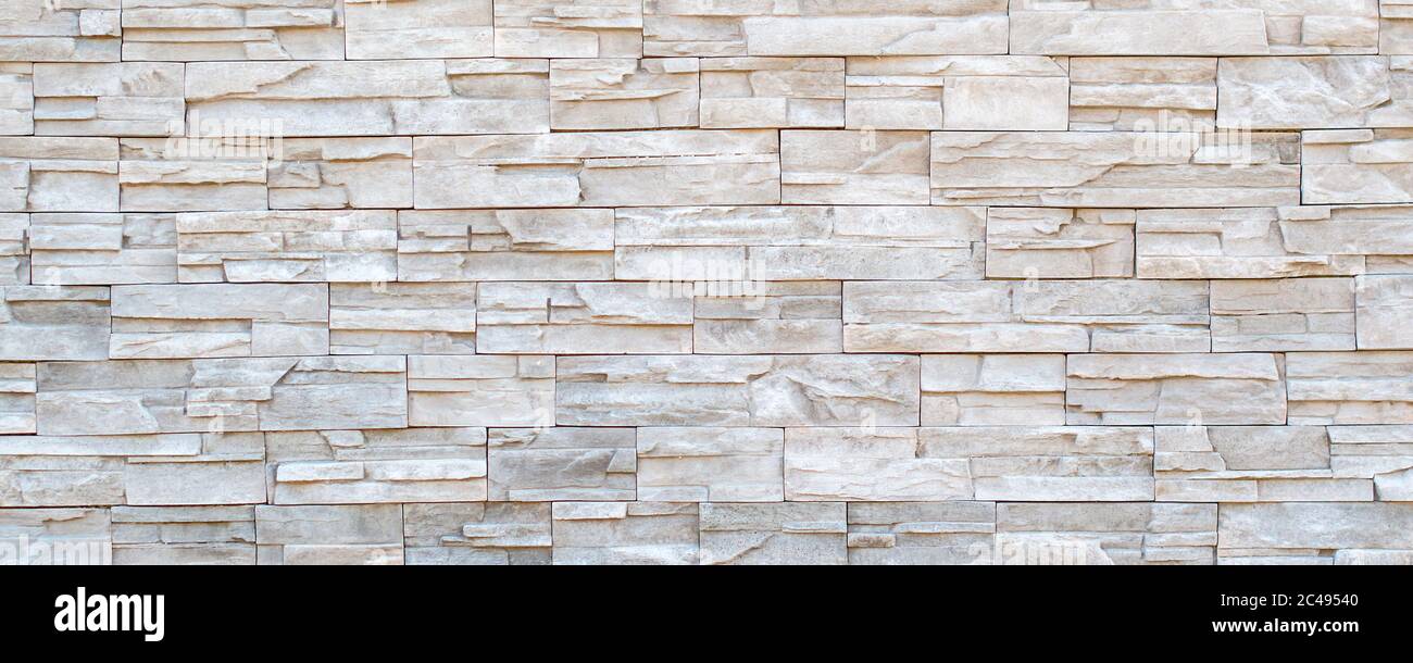 stone wall made of rocks with different size rectangles Stock Photo - Alamy