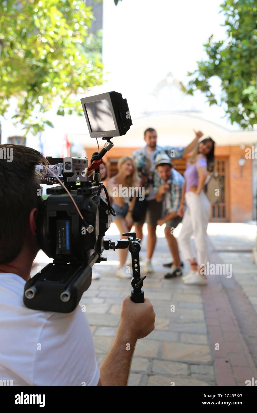 Behind the scene. Cameraman shooting the film scene with camera Stock ...