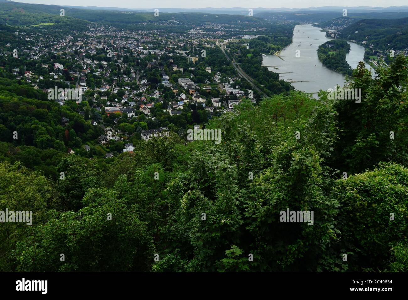 Top view of a small town by the river full of green trees Stock Photo ...