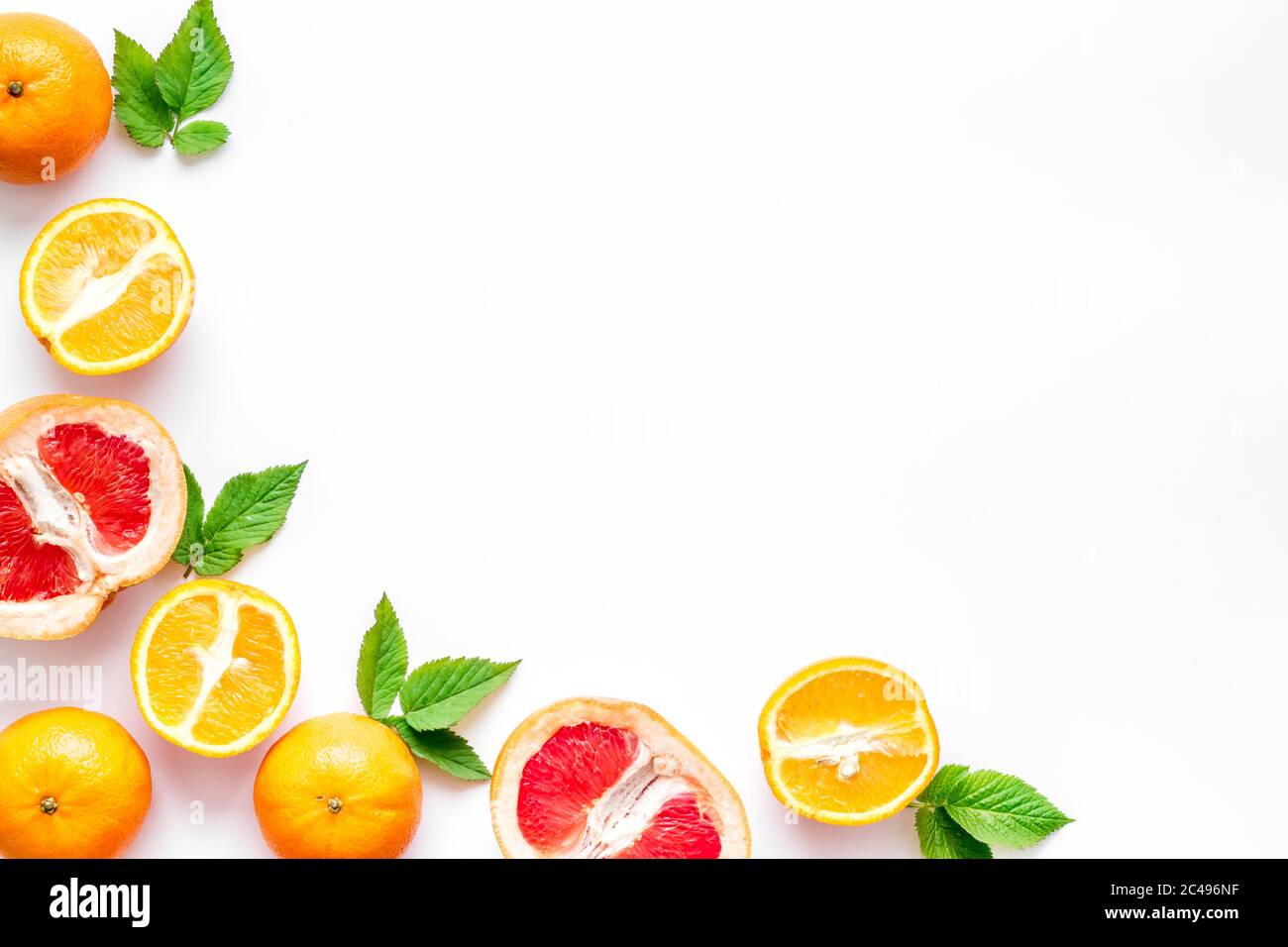 Citrus fruits frame corner on white background Stock Photo - Alamy