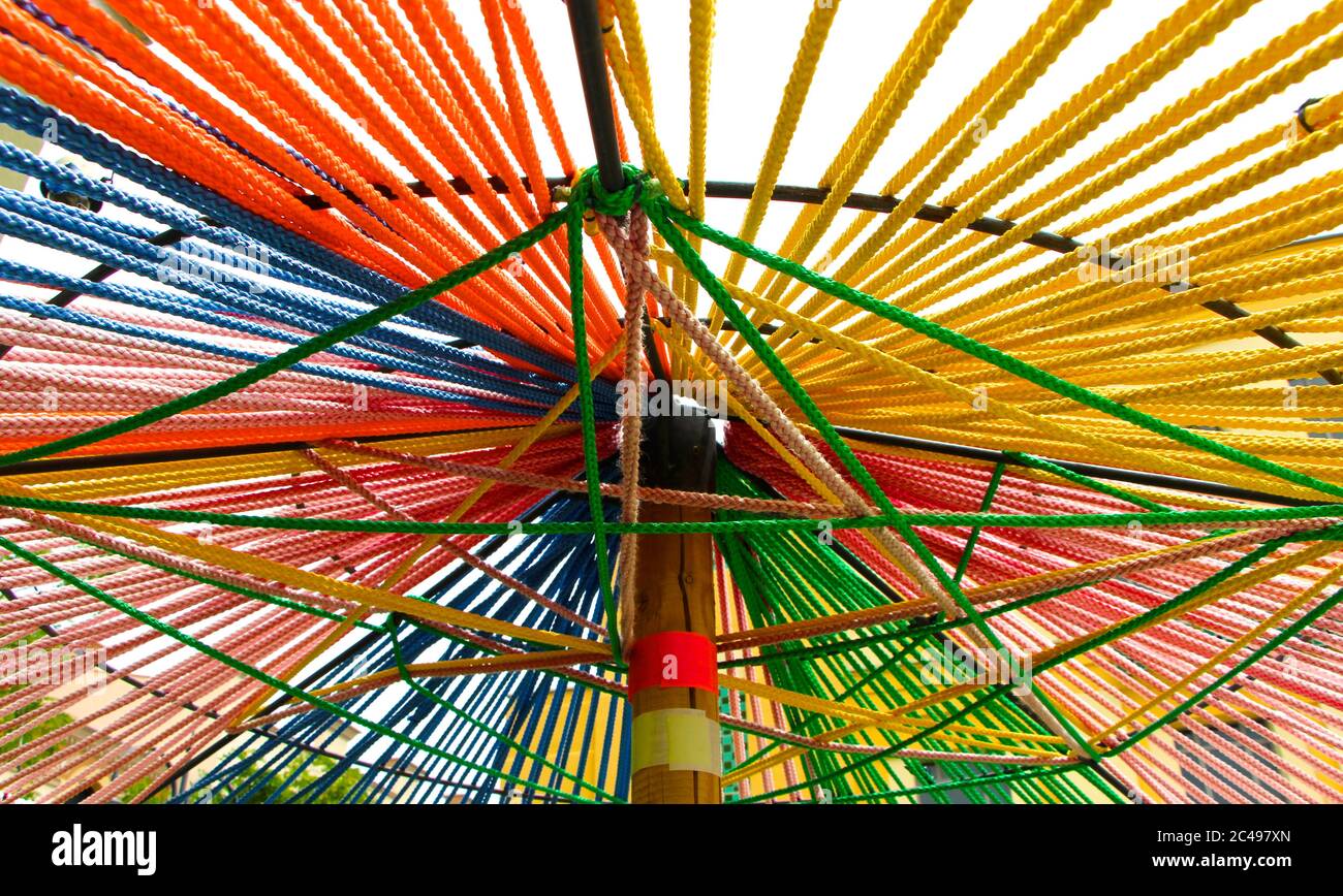 Colourful parasol shade umbrella made from coloured string rope Madrid ...