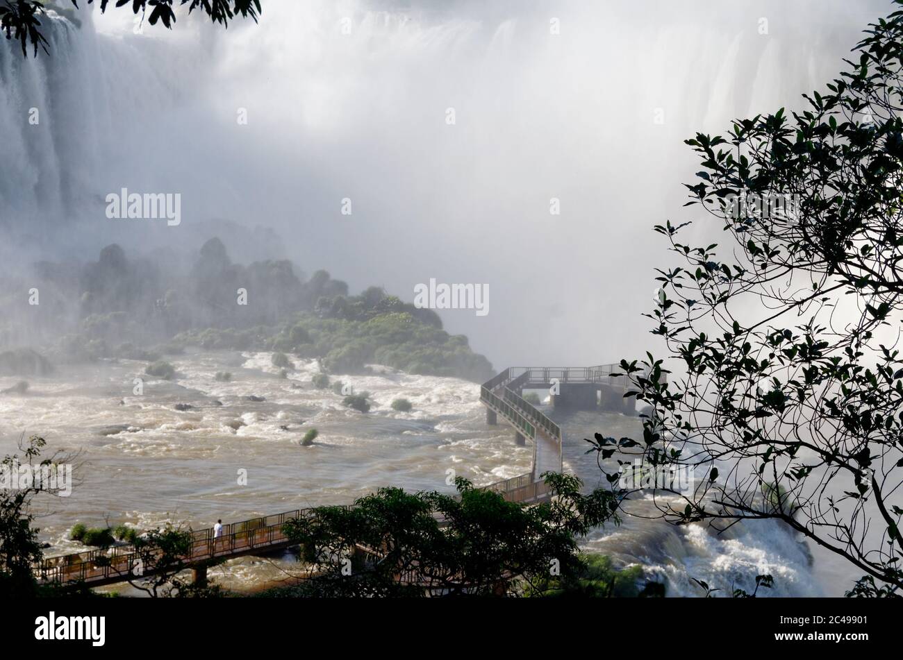 Water pouring over Devils Throat waterfall by the viewing platform at ...