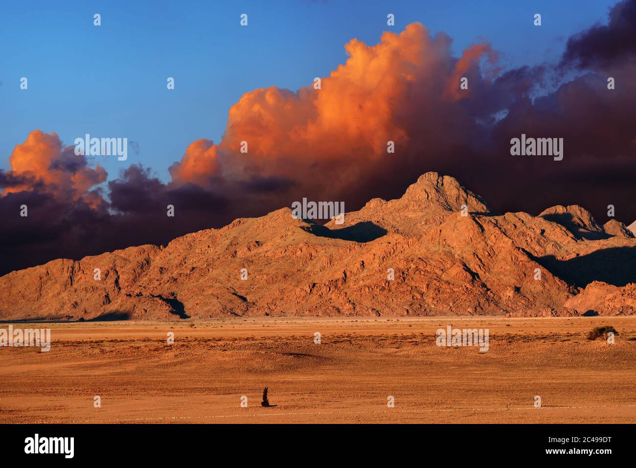 Beautiful namibian landscape with mountains and dramatic sky at sunset ...